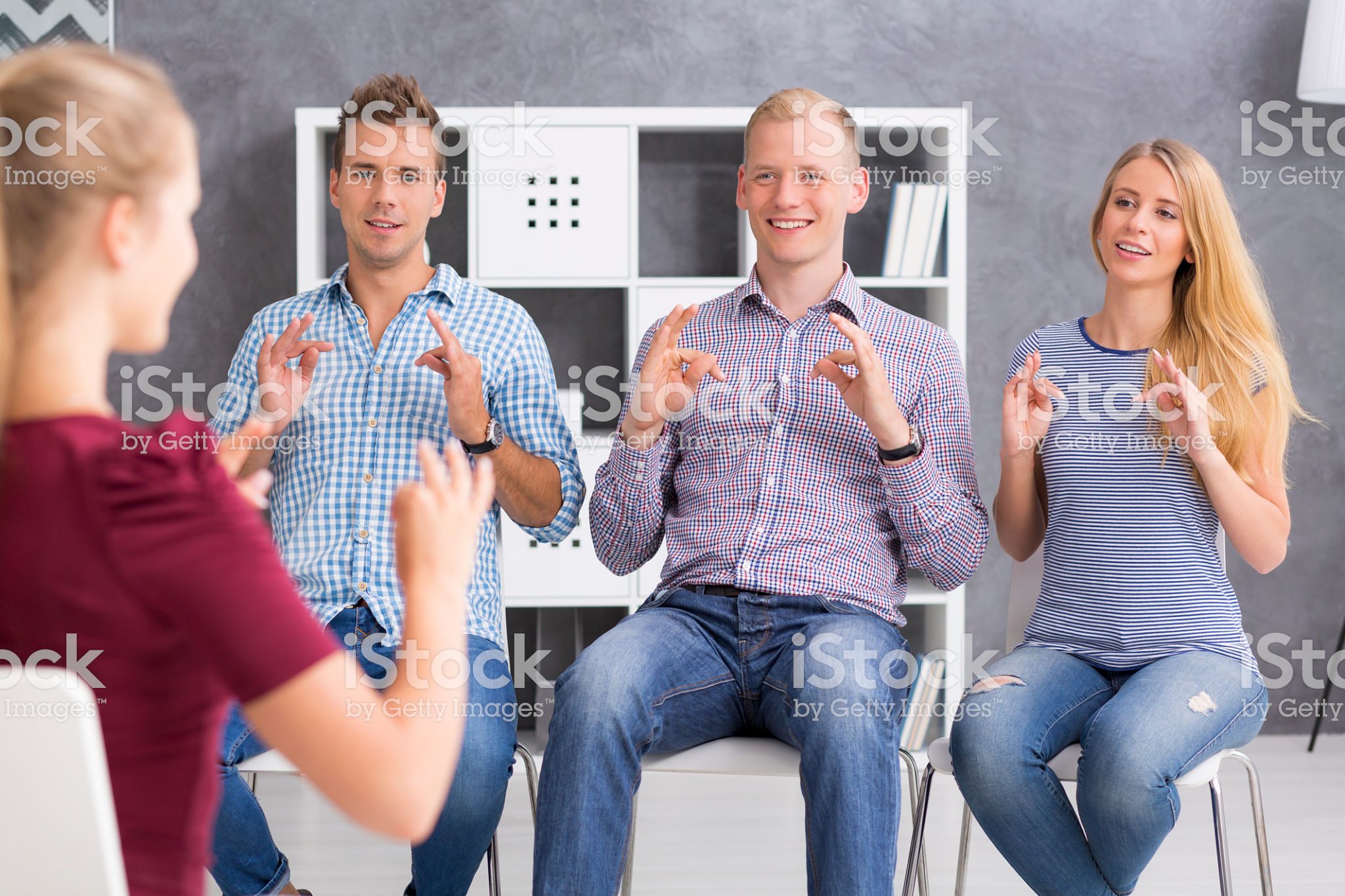 Group of young people learning a sign language - Affordable Language ...